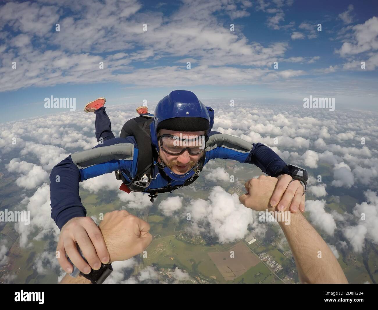 Skydiving caucasian man Stock Photo - Alamy