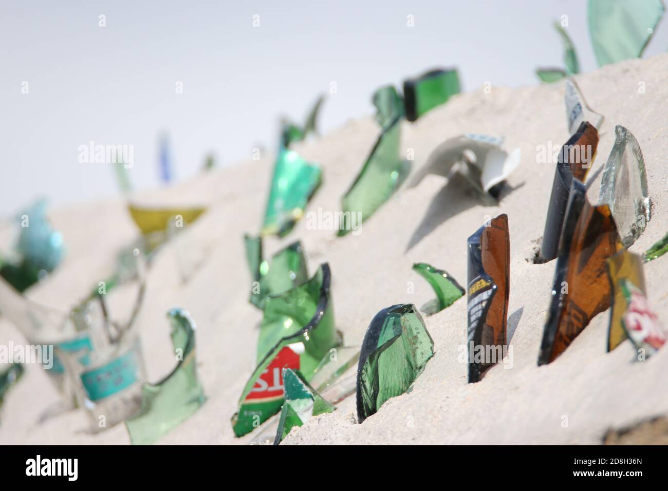 A wall's top was filled with hundreds of meters of glass shards to ...