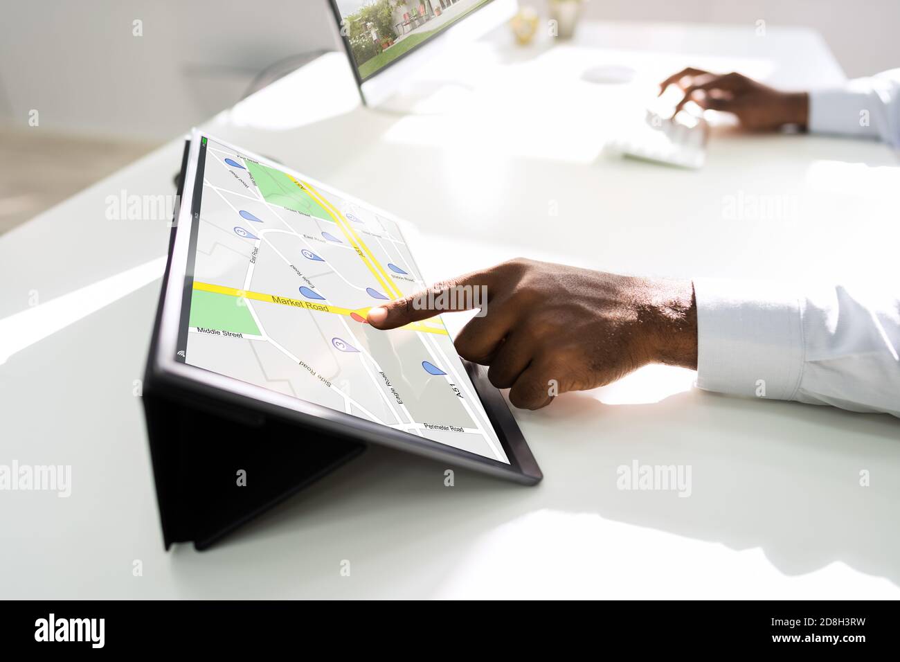 GPS Location Map Online On Tablet. African Man Using Navigator Stock ...