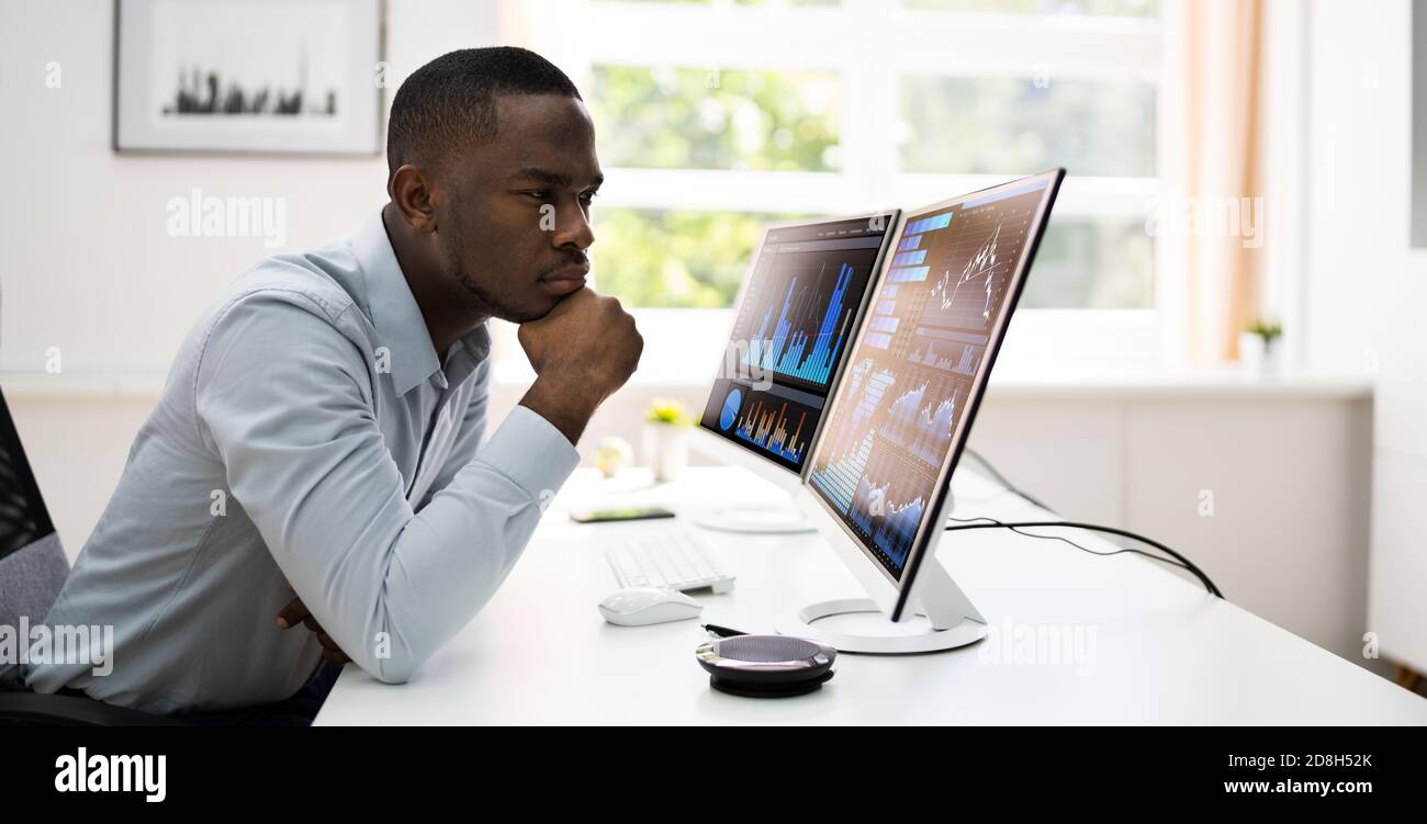 African american businessman thinking desk hi-res stock photography and ...
