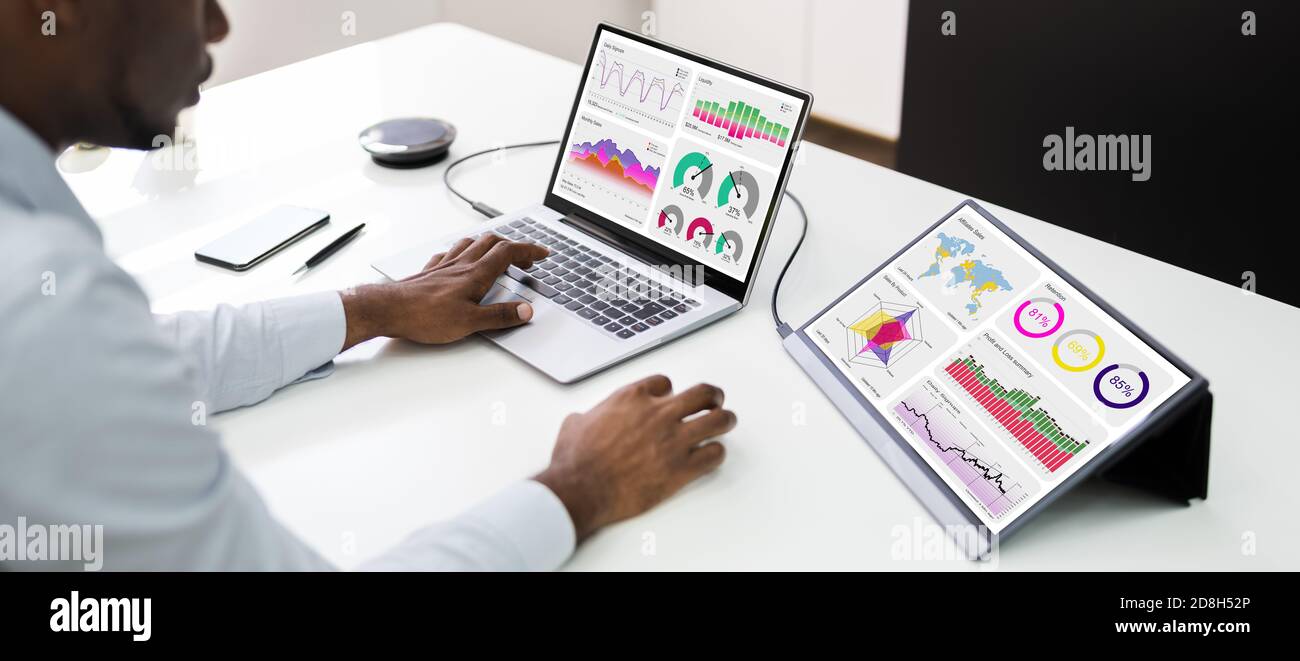 African American Business Man Analyst Using Data Analytics Stock Photo ...