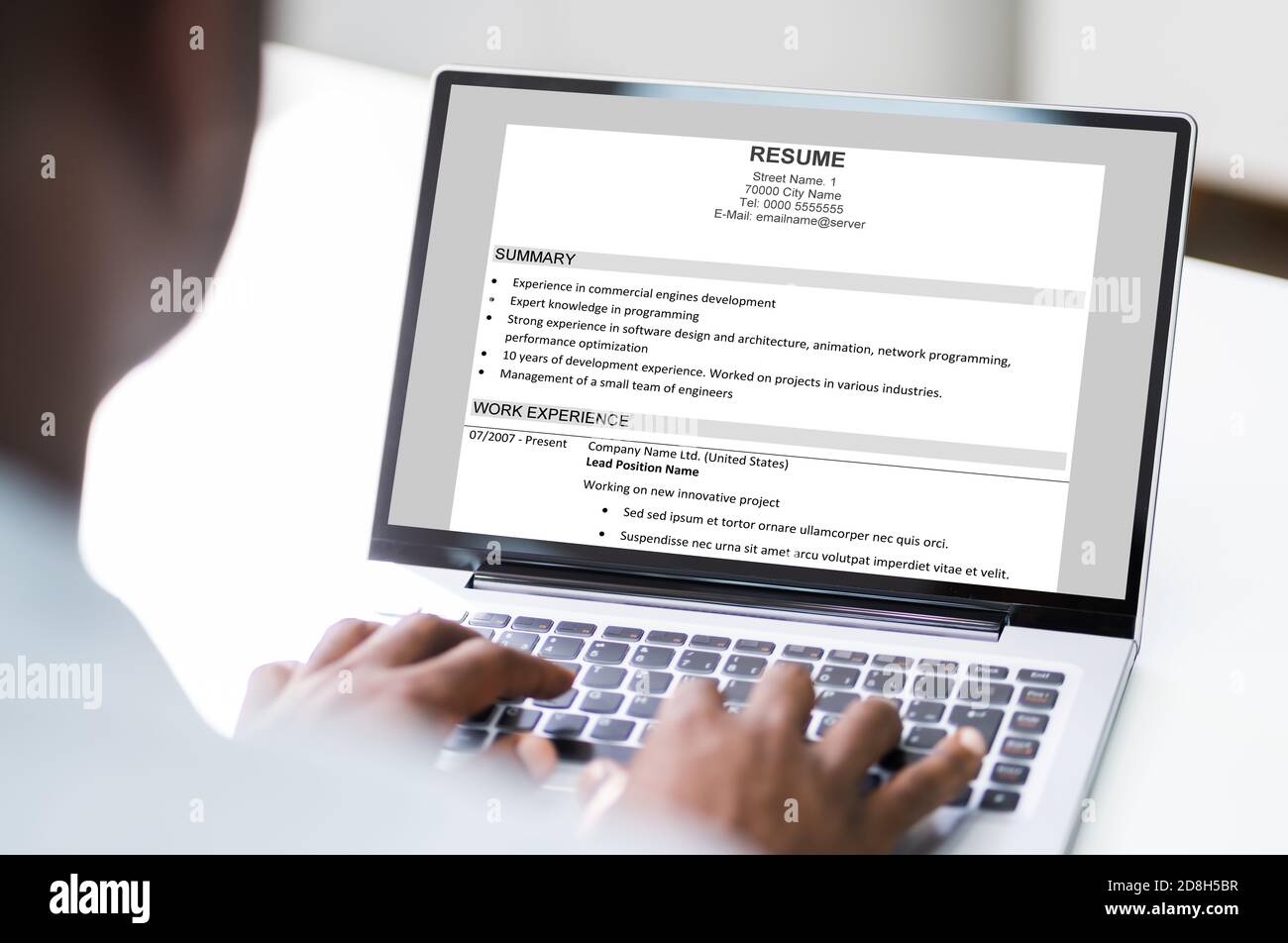 African American Resume CV Preparation On Laptop Computer Stock Photo ...