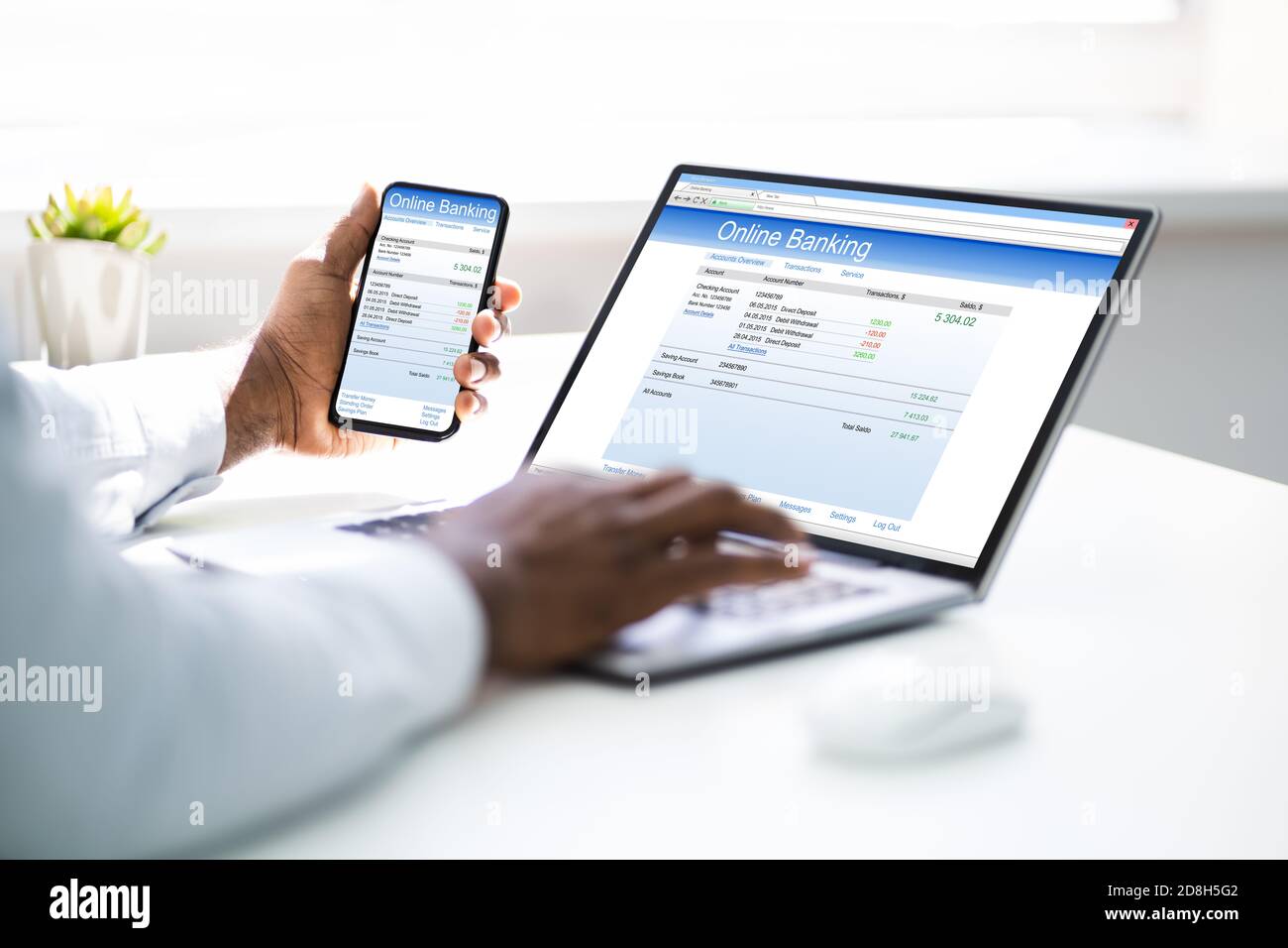 African American Using Online Bank Authentication For Transfer Stock ...