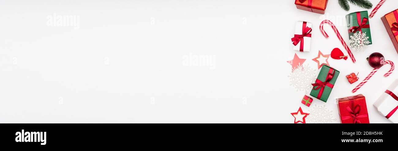 website header of gift boxes, decorative snowflakes, star-shaped ...