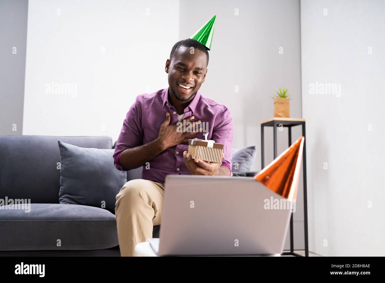 Young men celebrate video call hi-res stock photography and images - Alamy