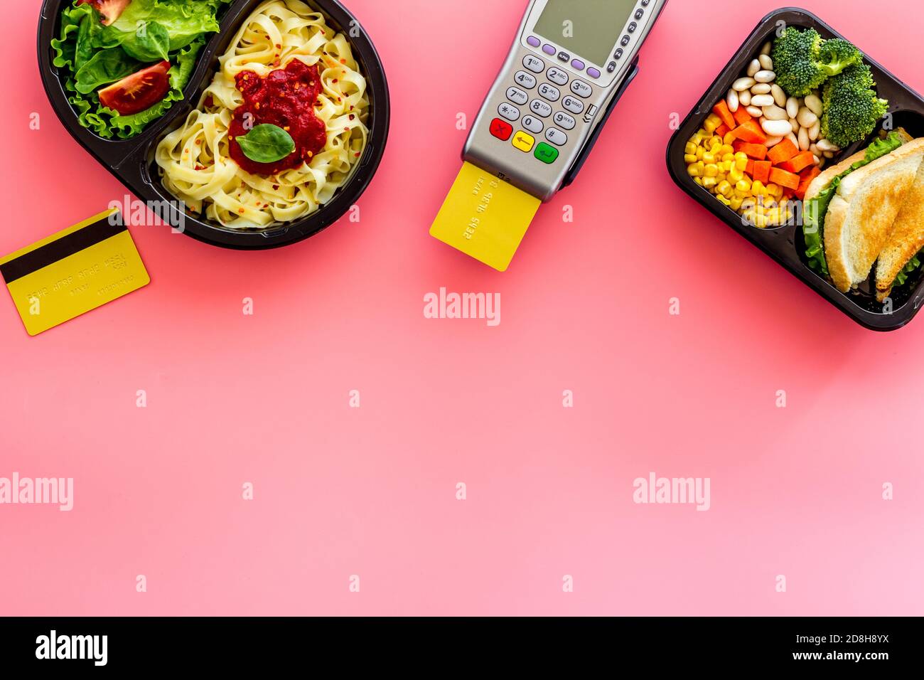 Food delivery payment with terminal and lunch boxes with meal Stock ...