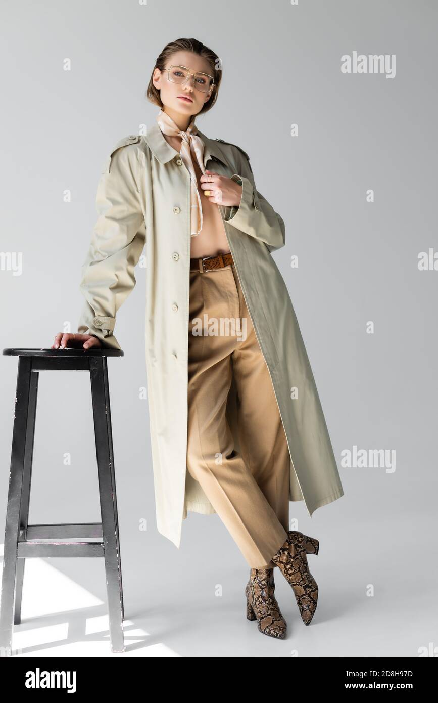 Leaning on stool hi-res stock photography and images - Alamy
