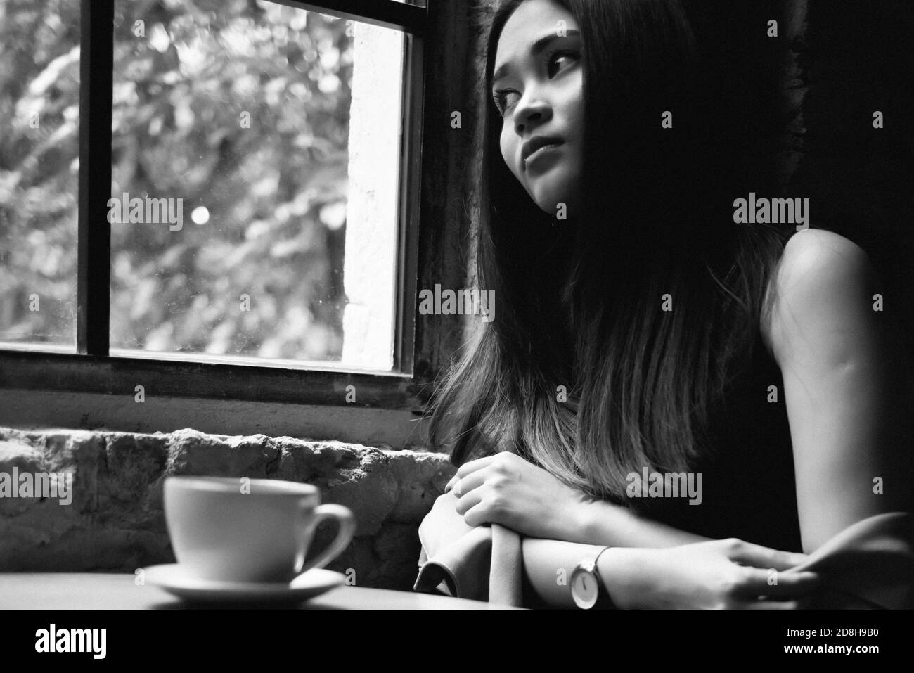 Beautiful model photoshoot at local cafe Stock Photo - Alamy