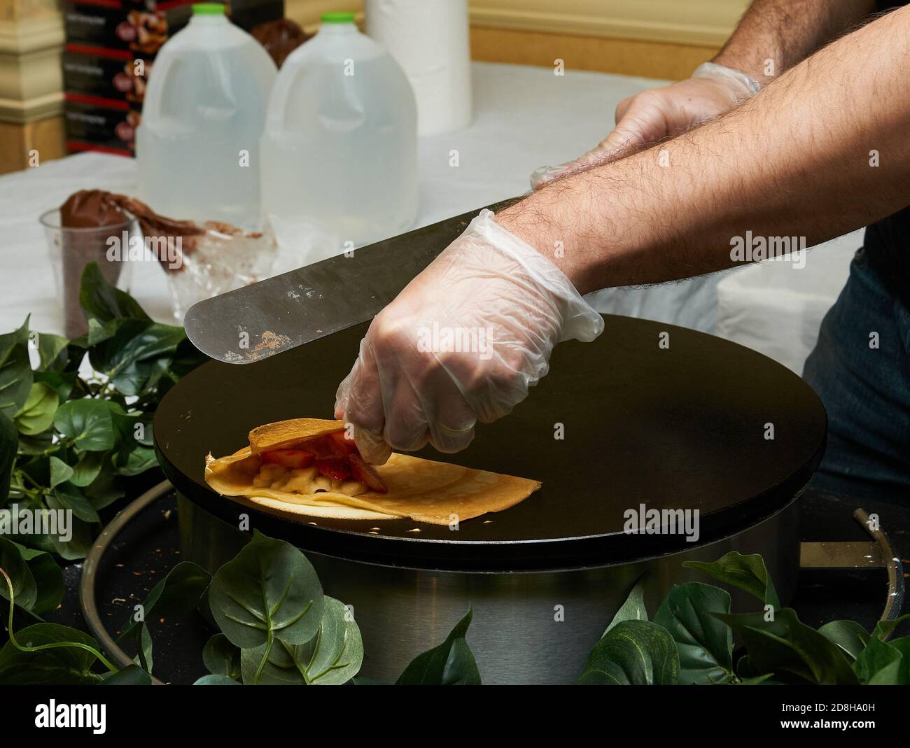 Process of making crepe with bananas and strawberries Stock Photo - Alamy