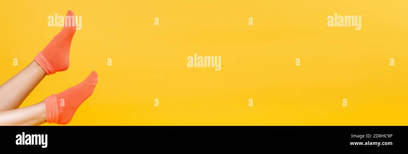 Yellow orange legs hi-res stock photography and images - Alamy