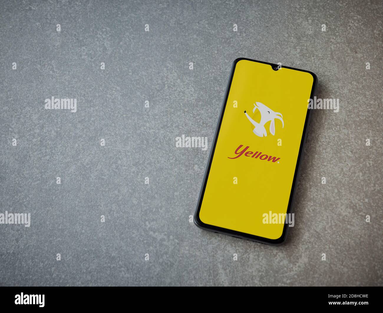 Lod, Israel - July 8, 2020: Yellow app launch screen with logo on the ...