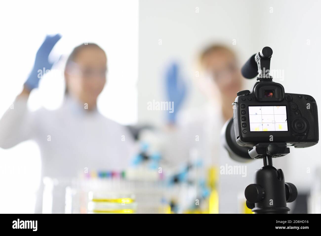 Camera captures female chemist bloggers who are waving in chemical ...