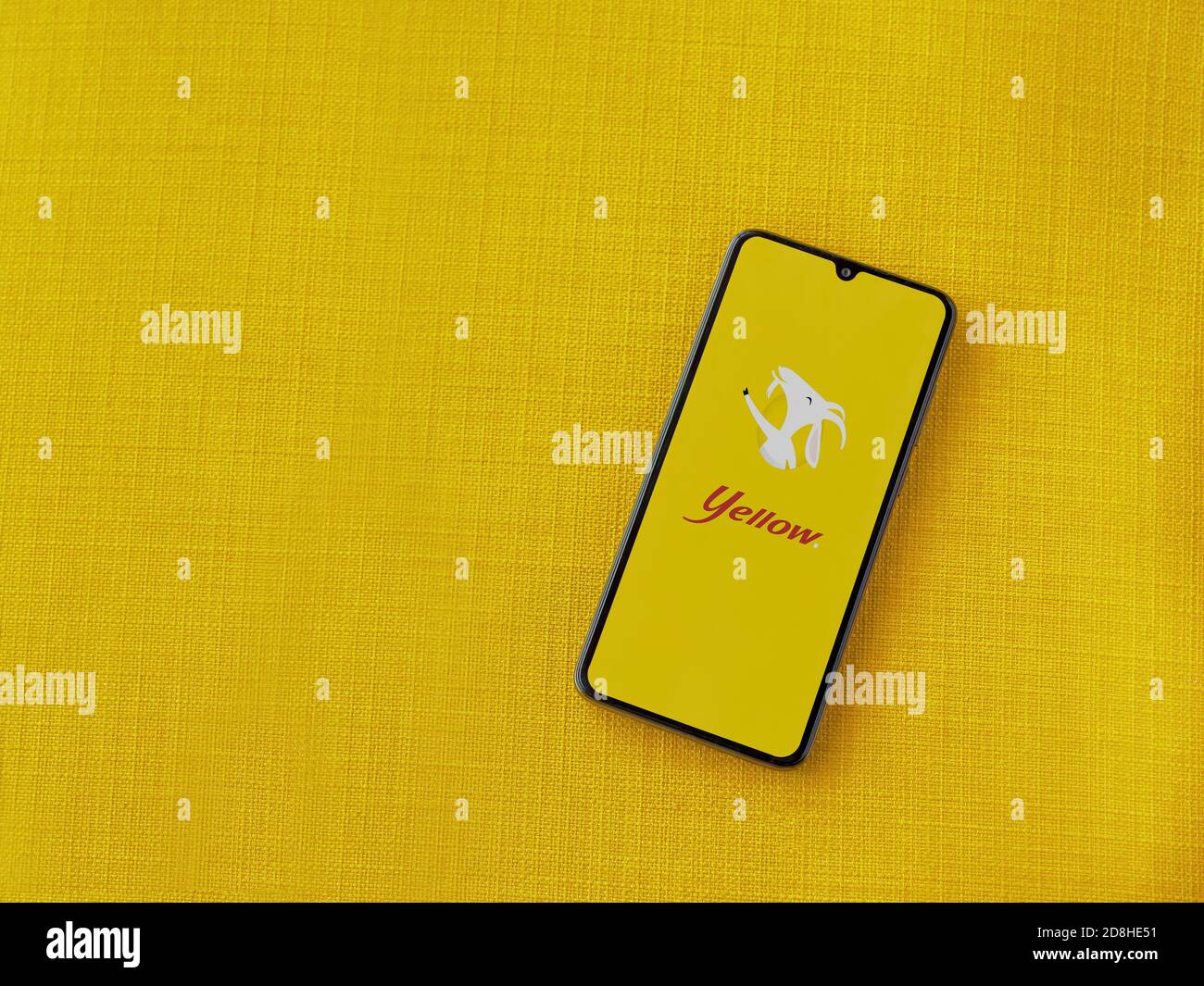 Lod, Israel - July 8, 2020: Yellow app launch screen with logo on the ...