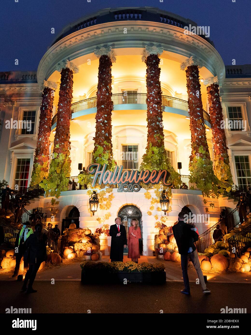 U.S. President Donald Trump and First Lady Melania Trump greet trick-or ...
