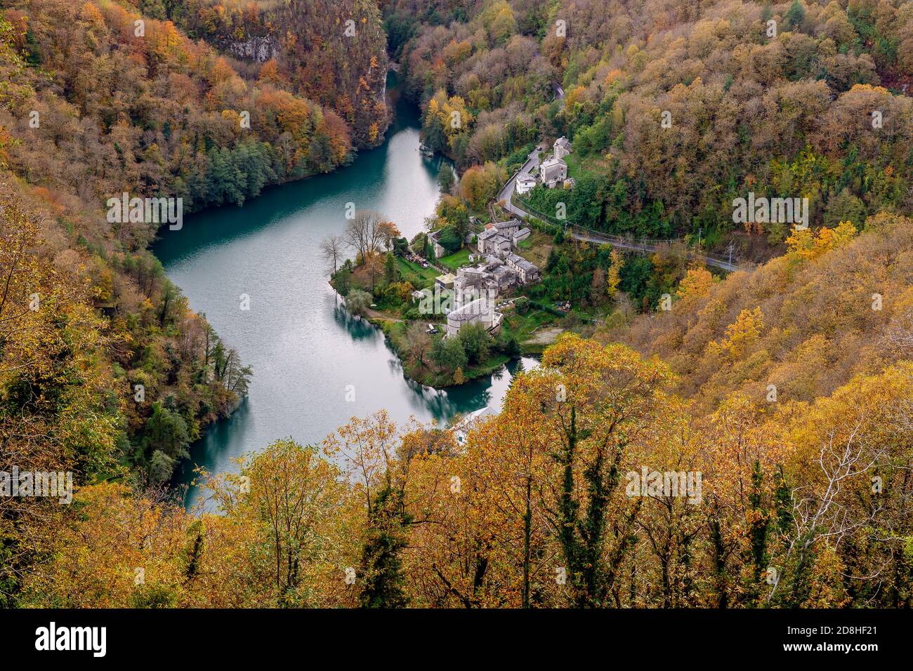 Superb aerial view of the lake and the ancient village of Isola Santa ...