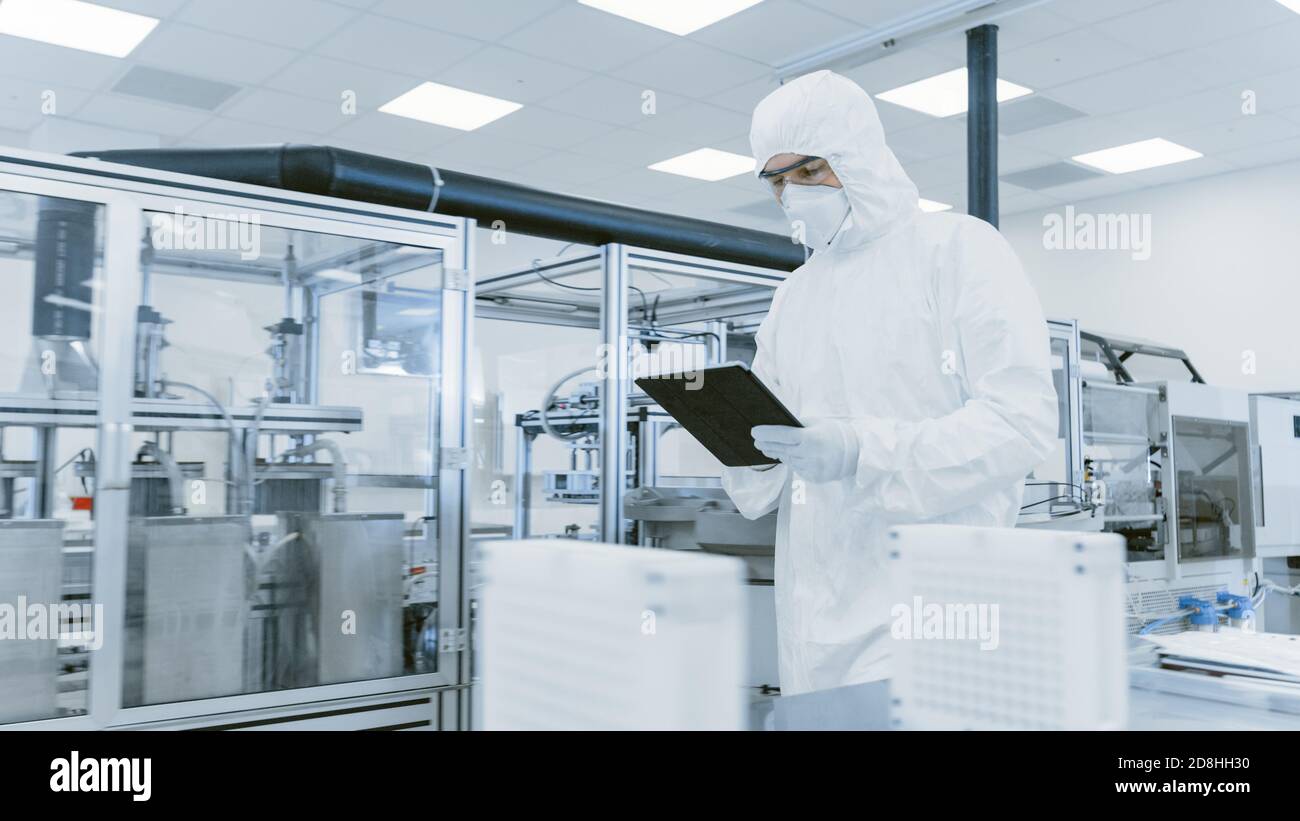 Quality Control Check: Scientist Using Digital Tablet Computer and ...