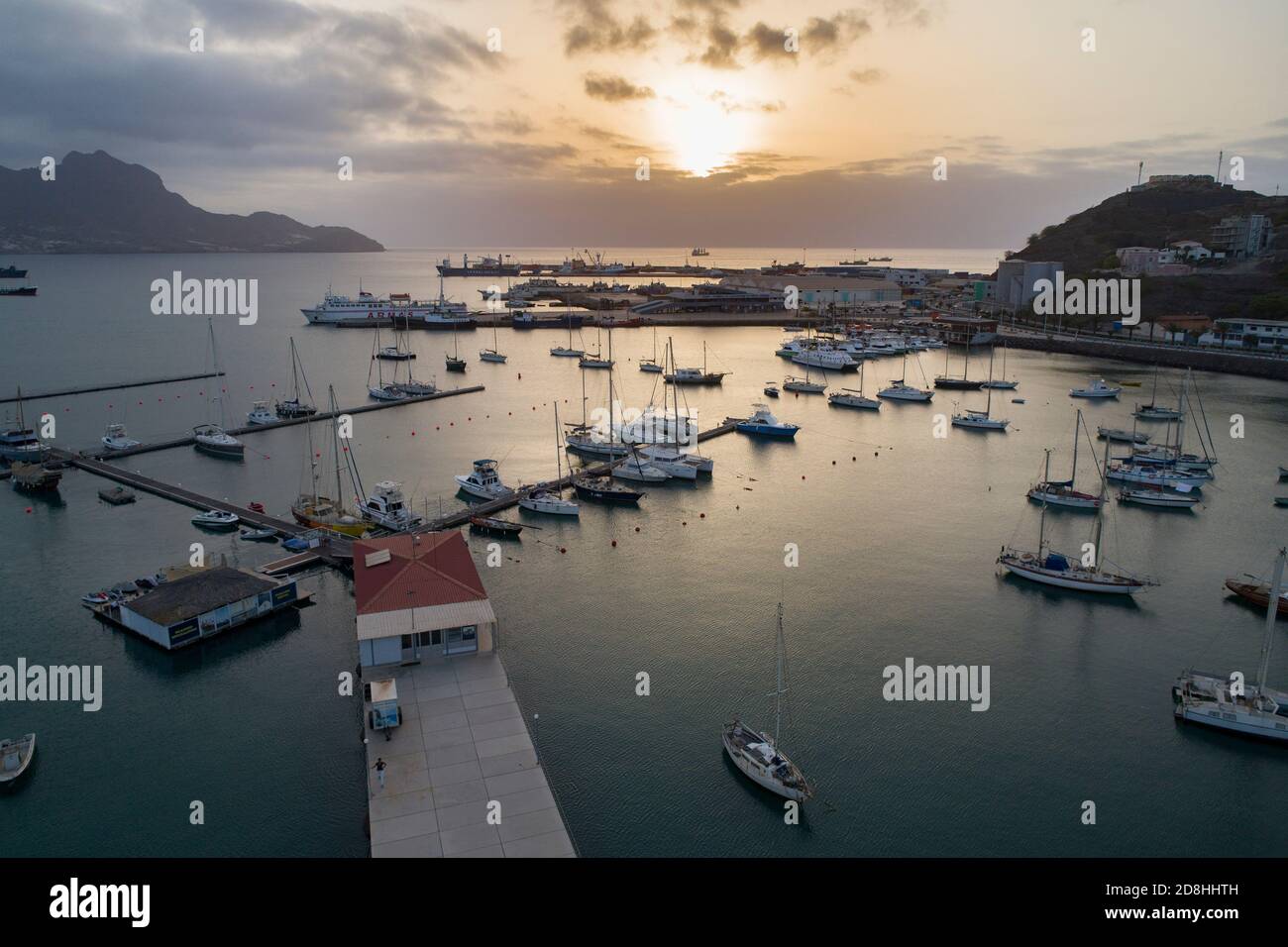 Mindelo, Cape Verde harbour with boats and a view of Monte Cara on the ...