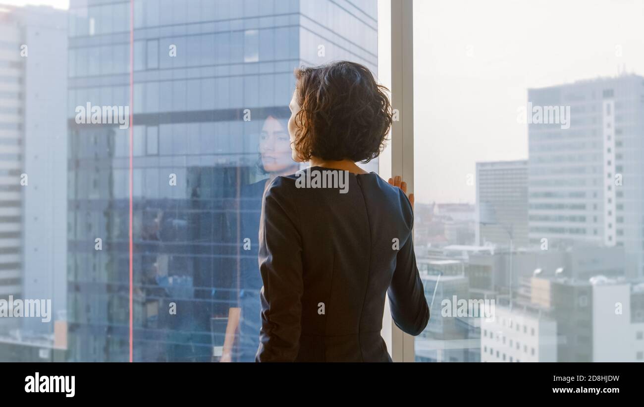 Shot of the Successful Businesswoman in a Stylish Dress in Her Office ...