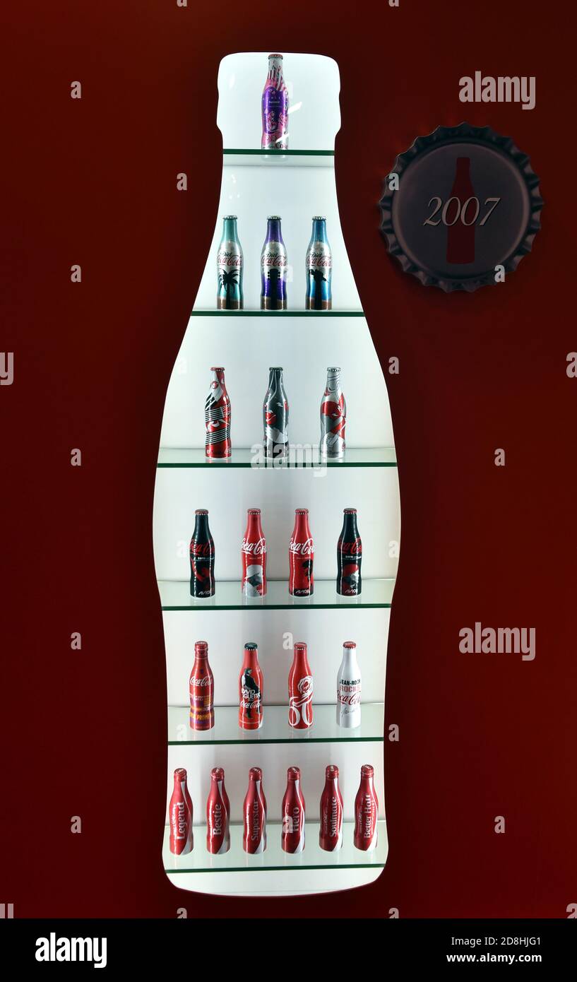 Bottles and toys of coca-cola are presented at the show in Hong Kong ...