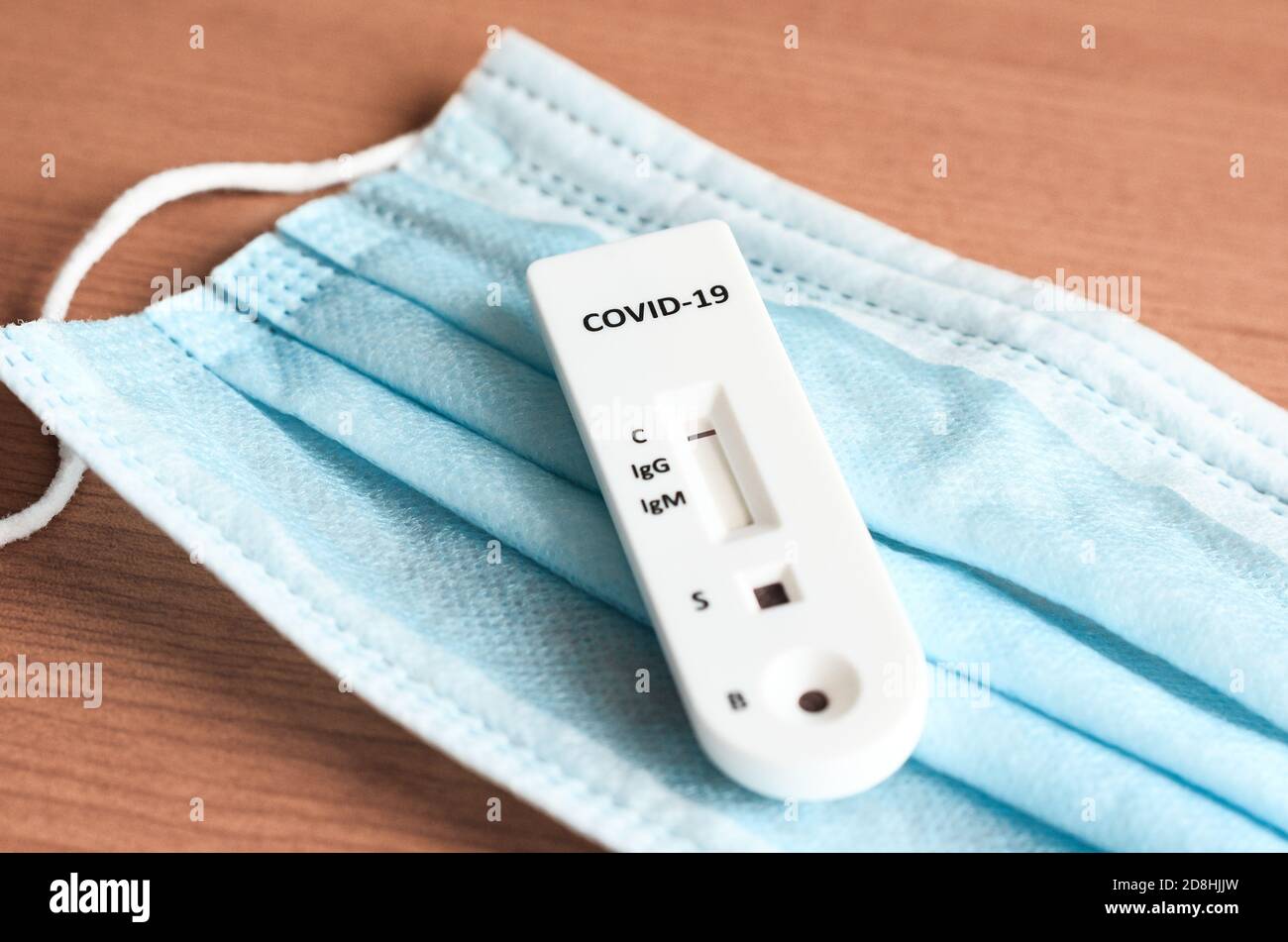 Close-up view of covid-19 IgG/IgM rapid test casette indicating a ...