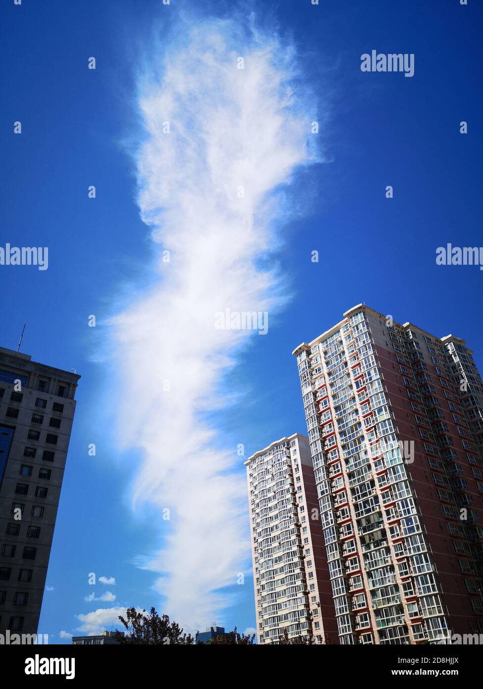 Clouds resembling Chinese dragon appear in the eastern and western side ...