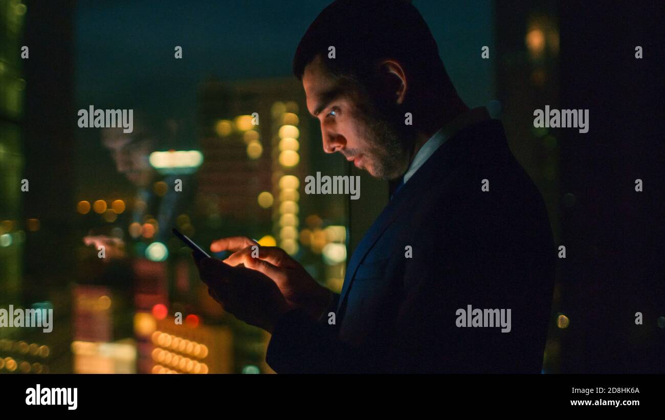 Late at Night in the Office Successful Businessman Types Email on the ...