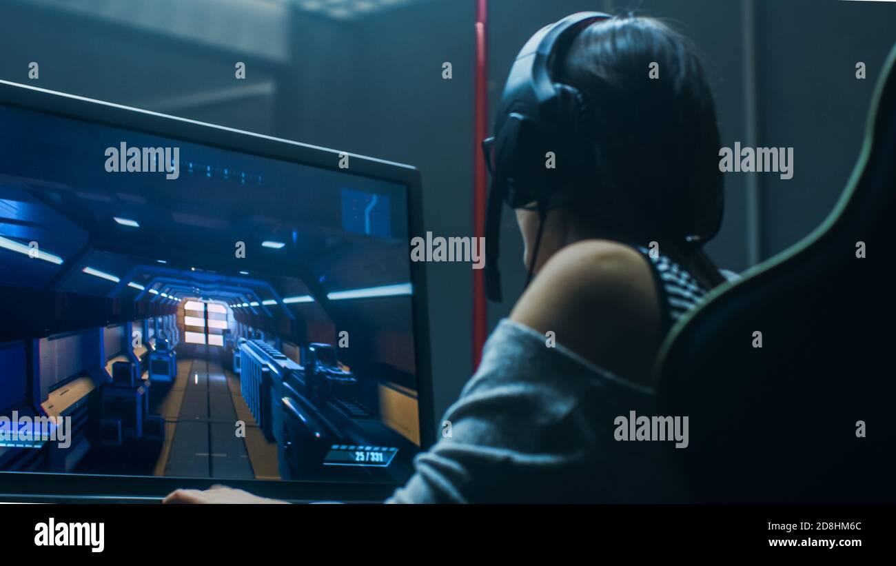 Beautiful Professional Gamer Girl Playing in First-Person Shooter ...