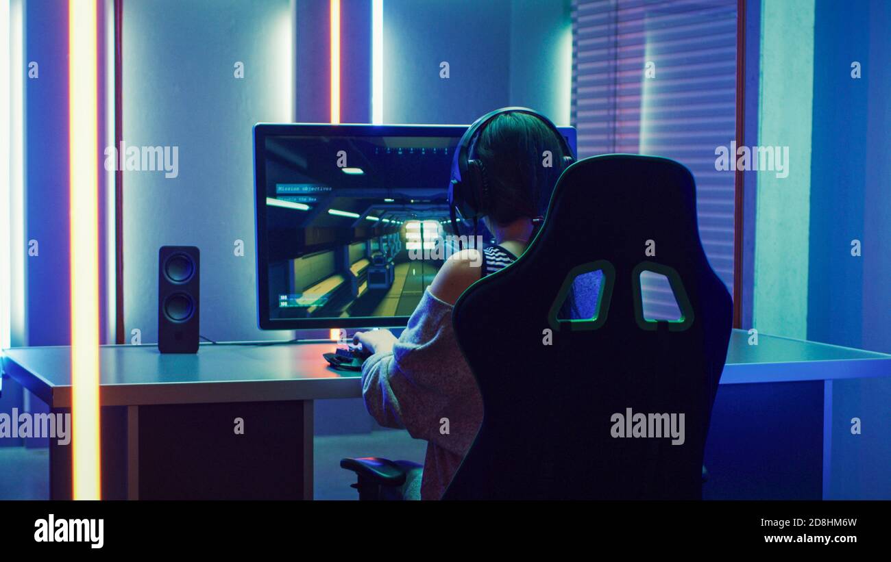Beautiful Professional Gamer Girl Playing in First-Person Shooter ...
