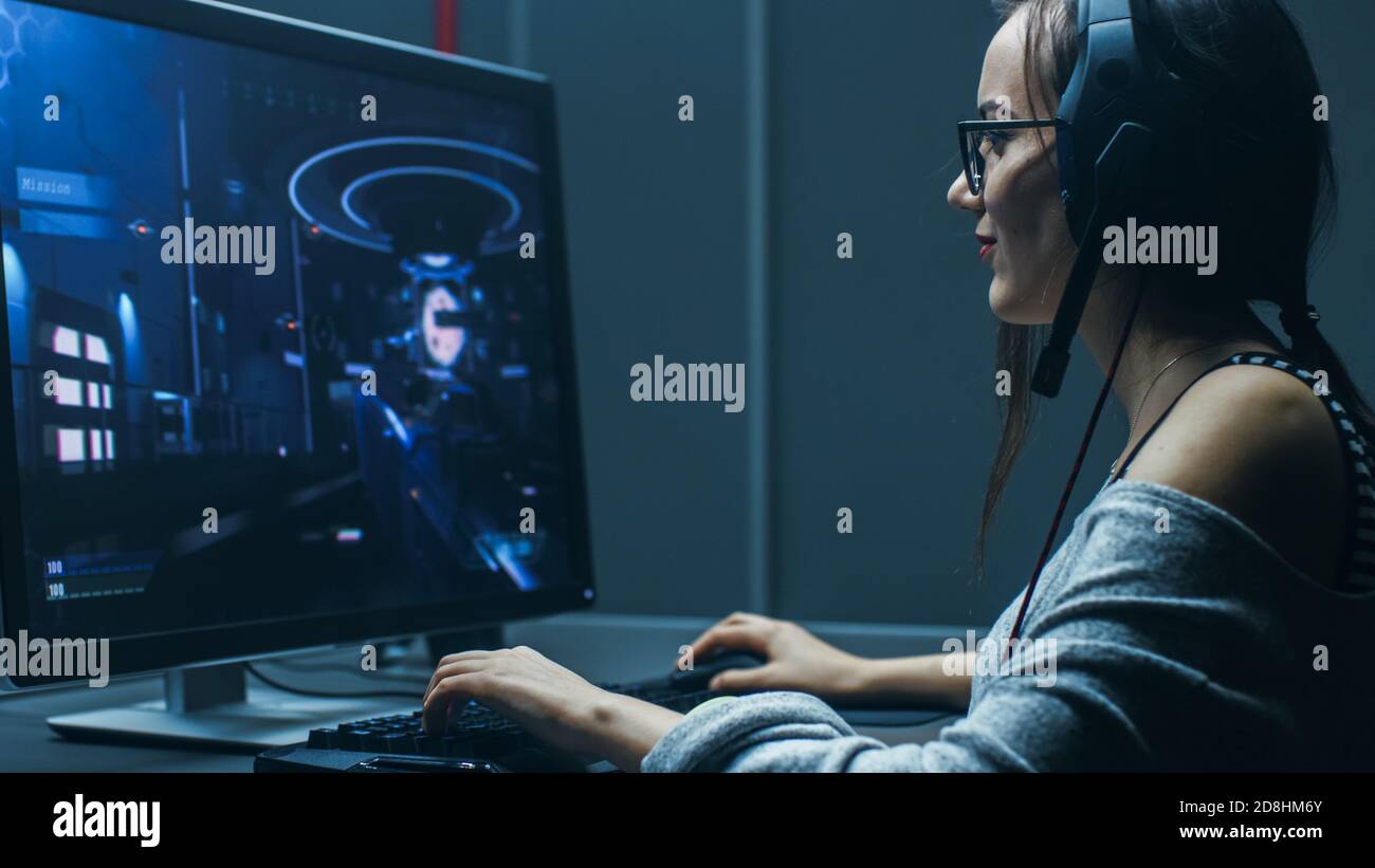 Shot of the Beautiful Professional Gamer Girl Playing in First-Person ...