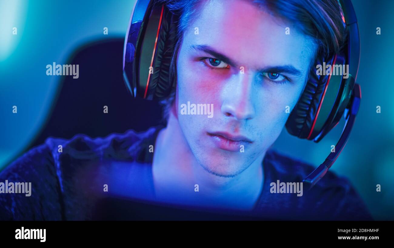 Portrait of the Young Handsome Pro Gamer Playing in Online Video Game ...