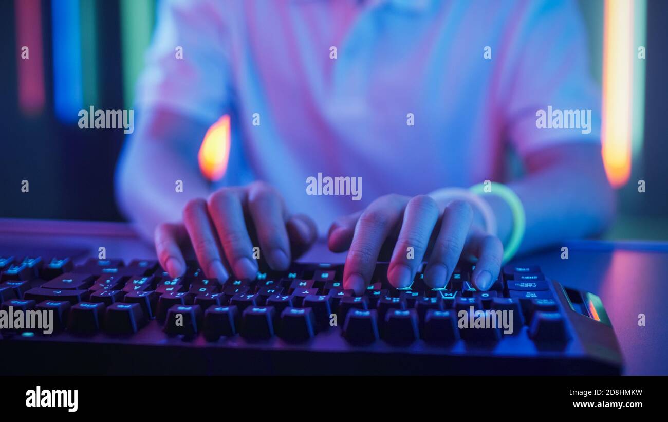 Close-up on the Hands of the Gamer Playing in the Video Game Using ...