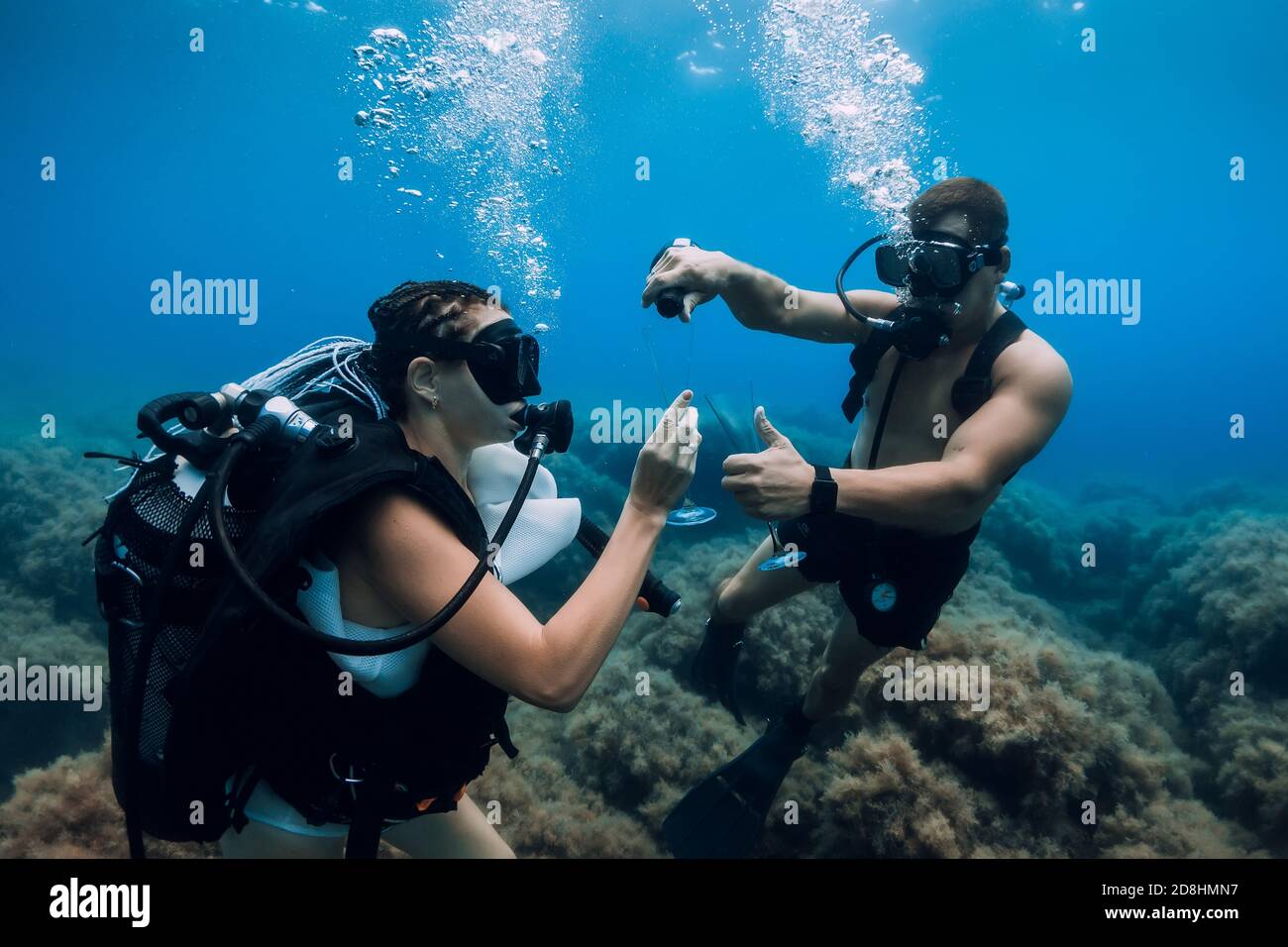 August 20, 2020. Anapa, Russia. Couple of scuba divers glides ...