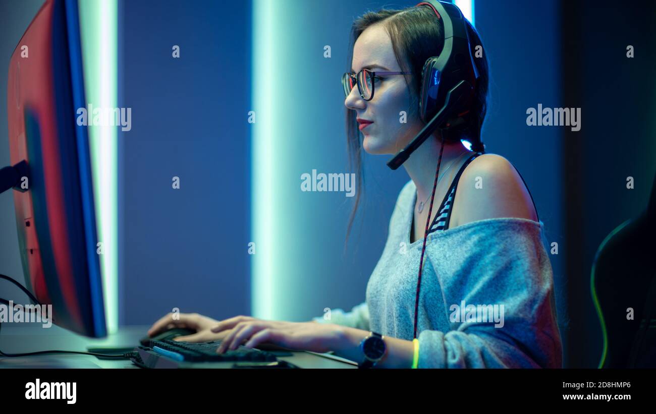 Beautiful Professional Gamer Girl Playing in First-Person Shooter ...
