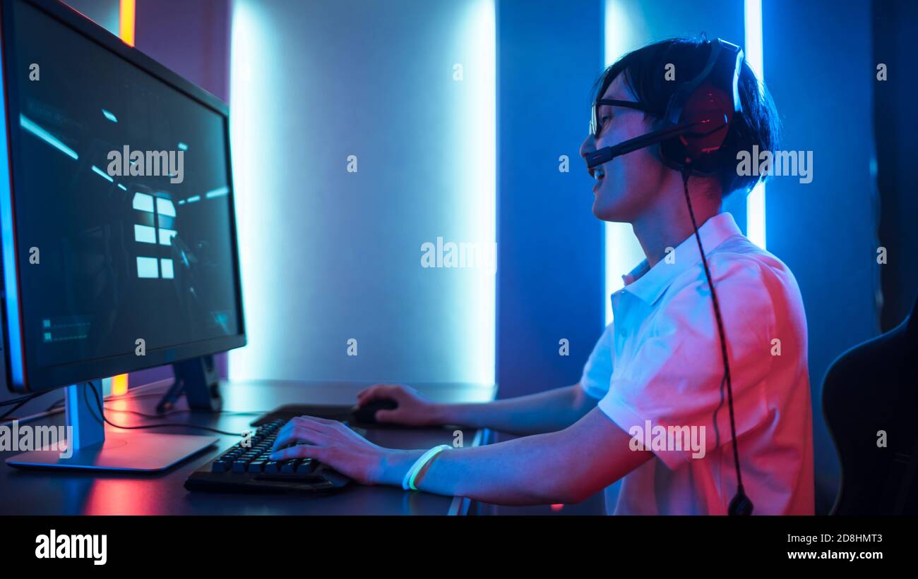 Side View Shot of Professional Gamer Playing in First-Person Shooter ...