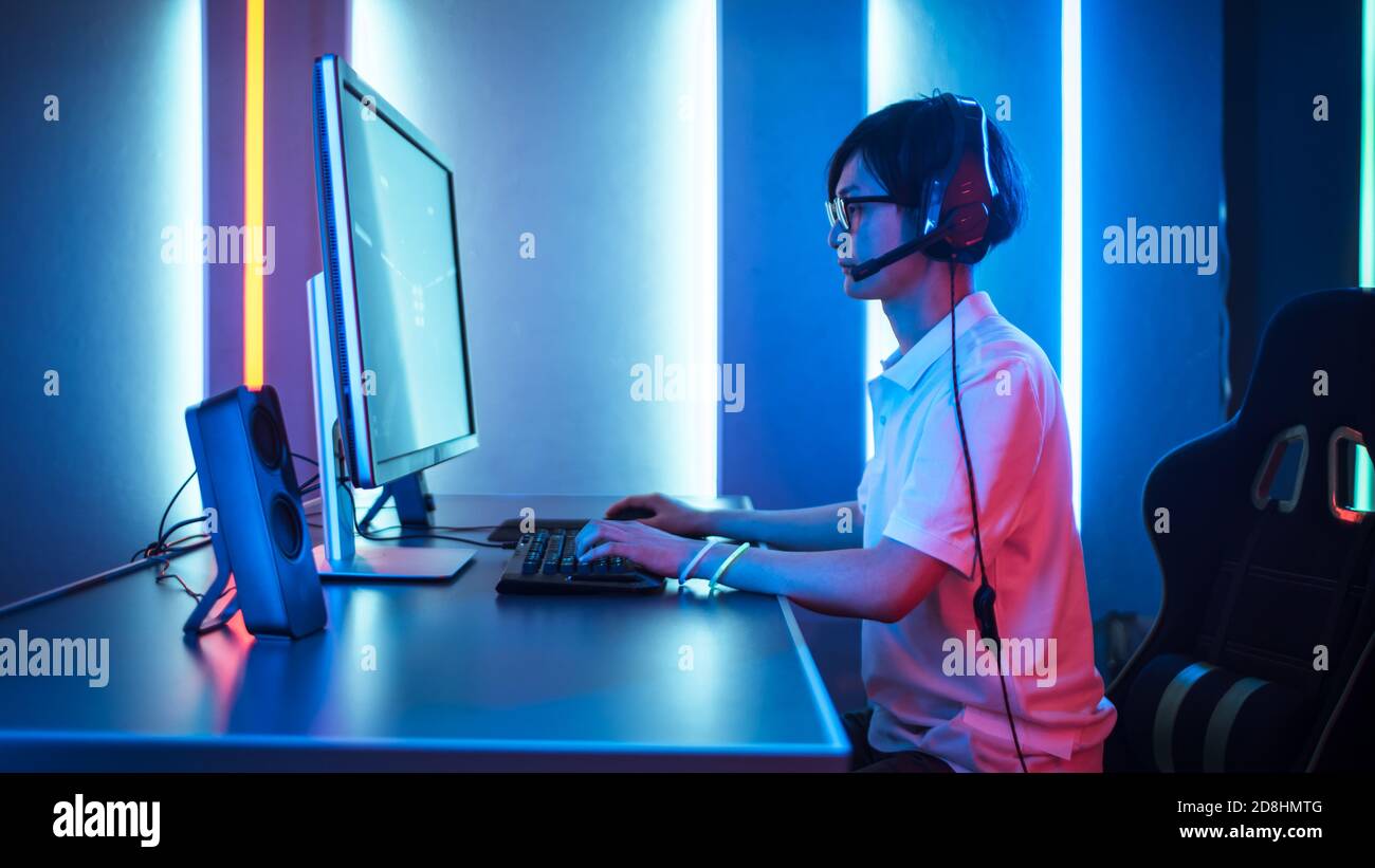 Side View Shot of Professional Gamer Playing in First-Person Shooter ...