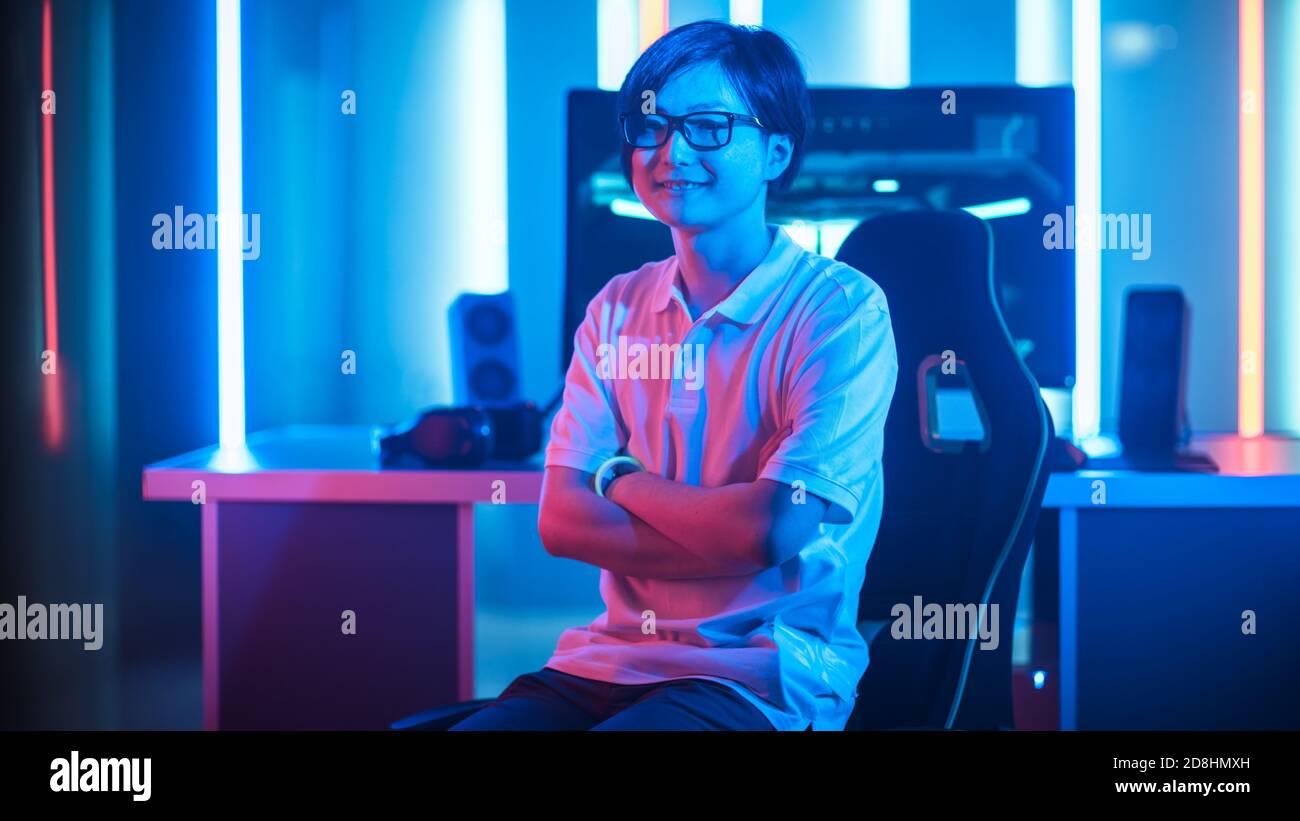 Shot of the Professional Gamer Sitting on His Gaming Chair and Smiling ...