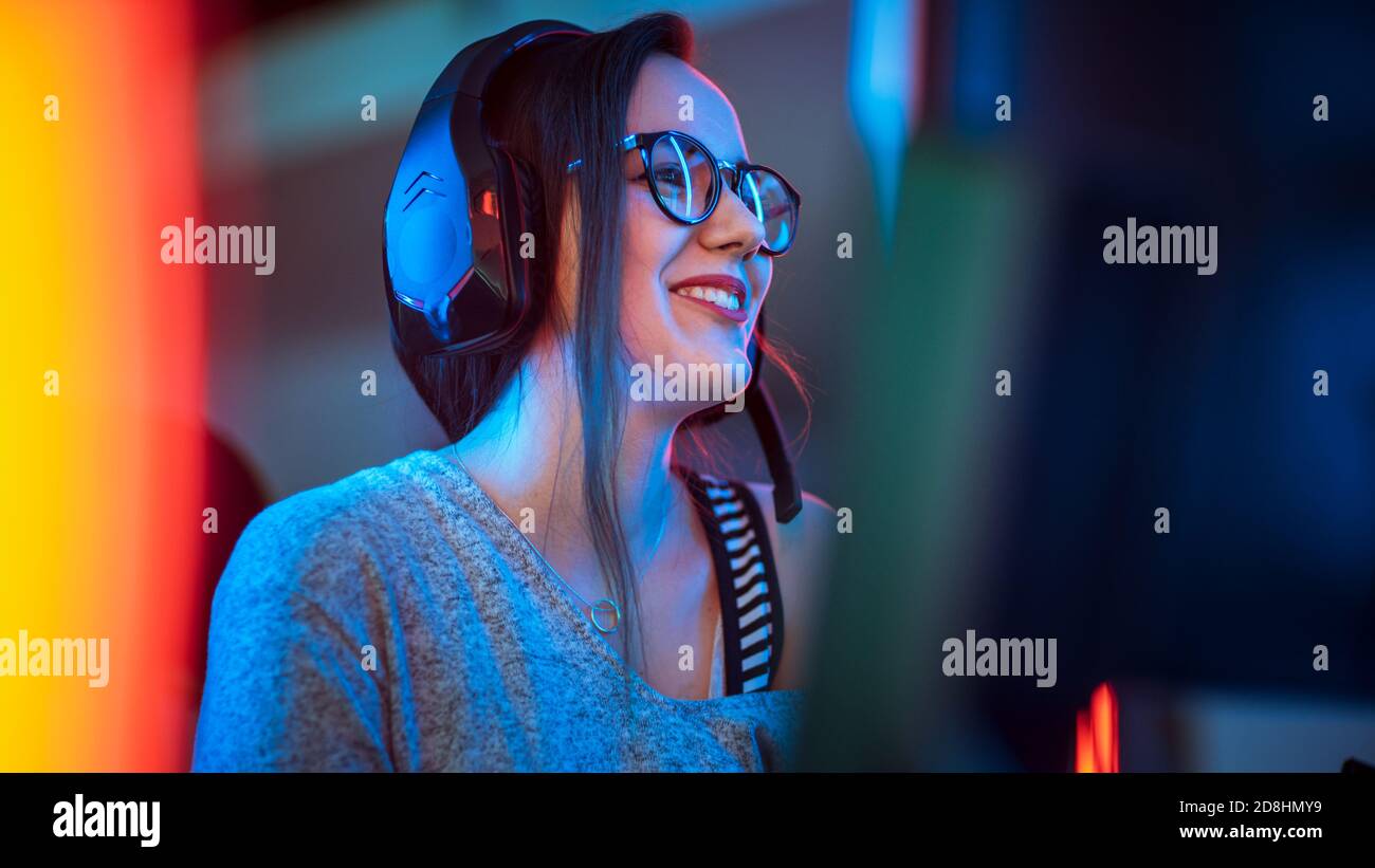 Portrait Shot of a Smiling Beautiful Professional Gamer Girl Playing in ...