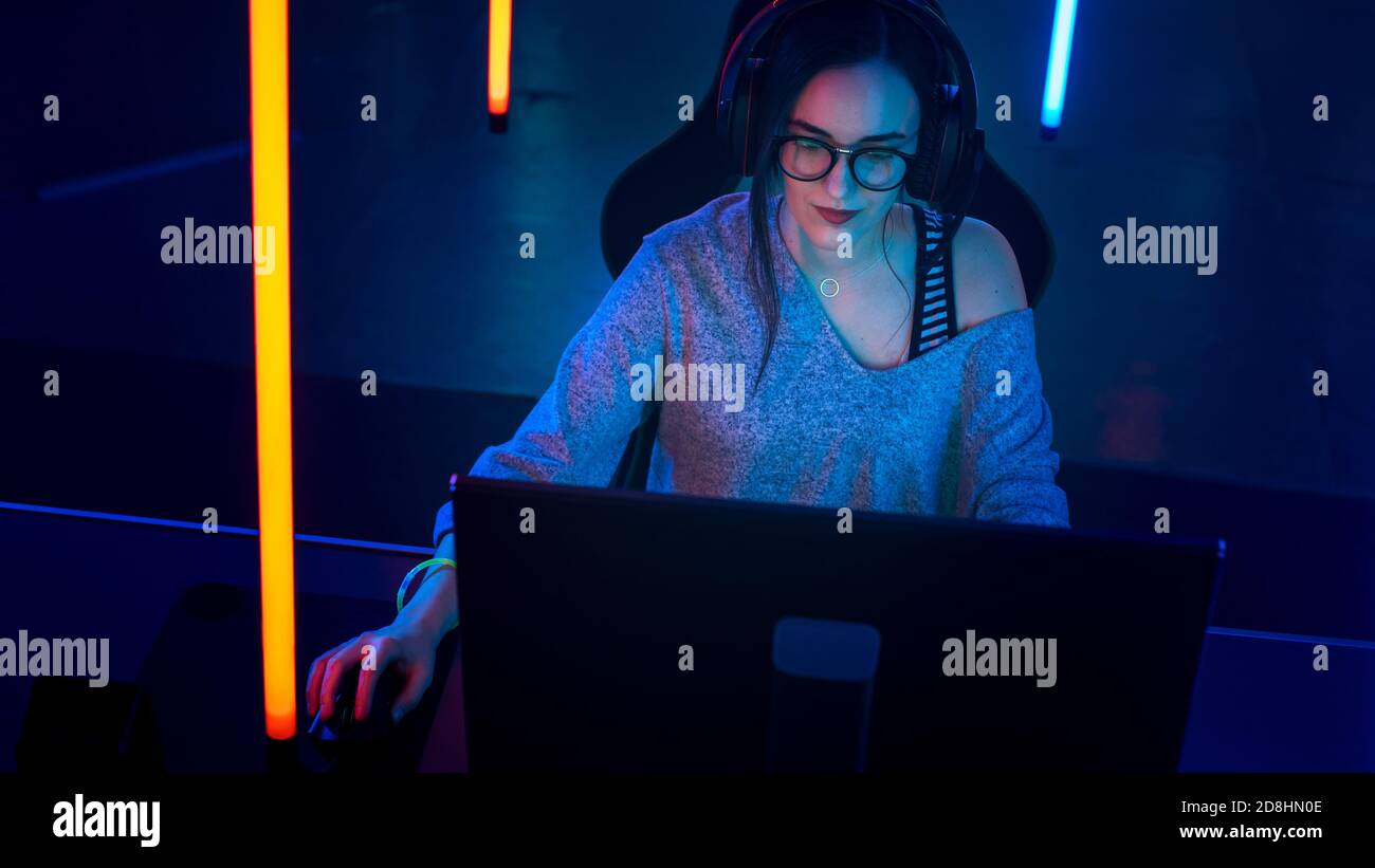 High Angle Shot of the Beautiful Friendly Pro Gamer Girl Playing in ...