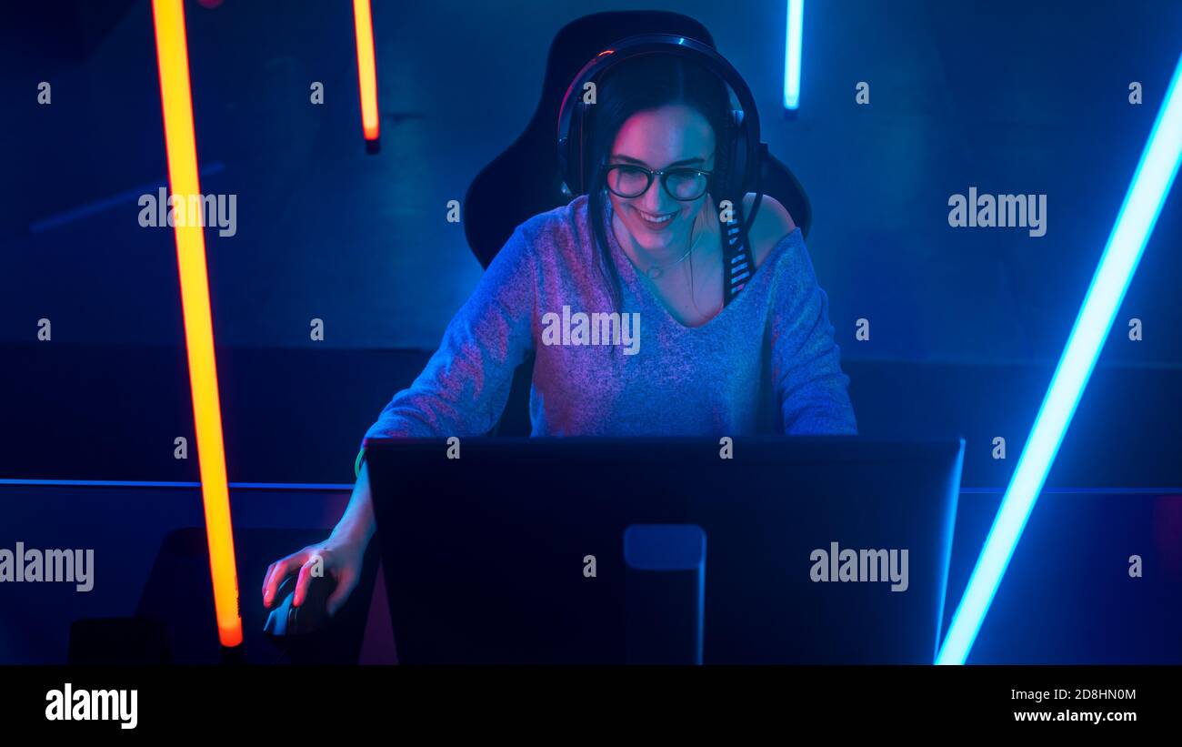 High Angle Shot of the Beautiful Friendly Pro Gamer Girl Playing in ...