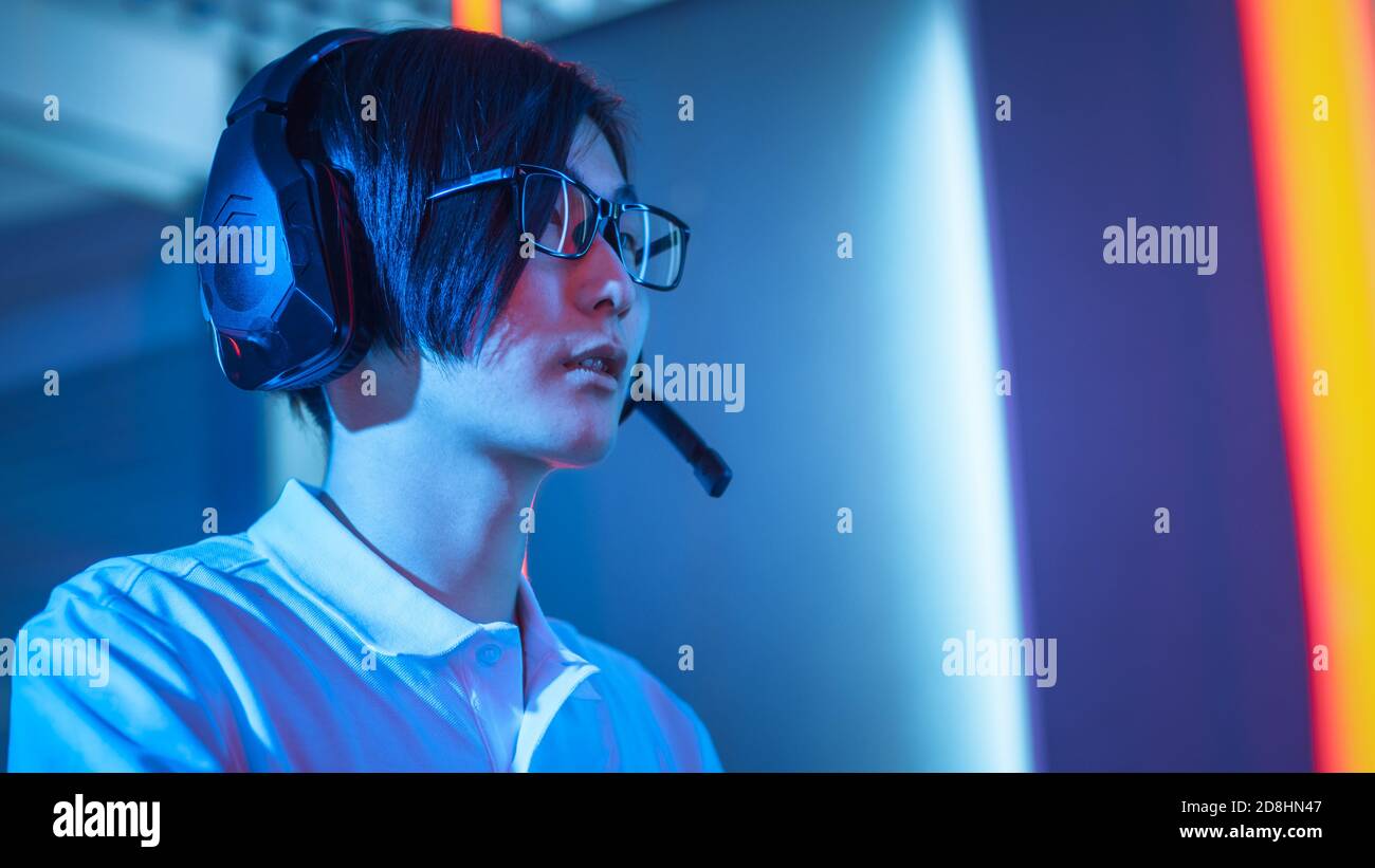 Professional East Asian Gamer Playing in Online Video Game on His ...