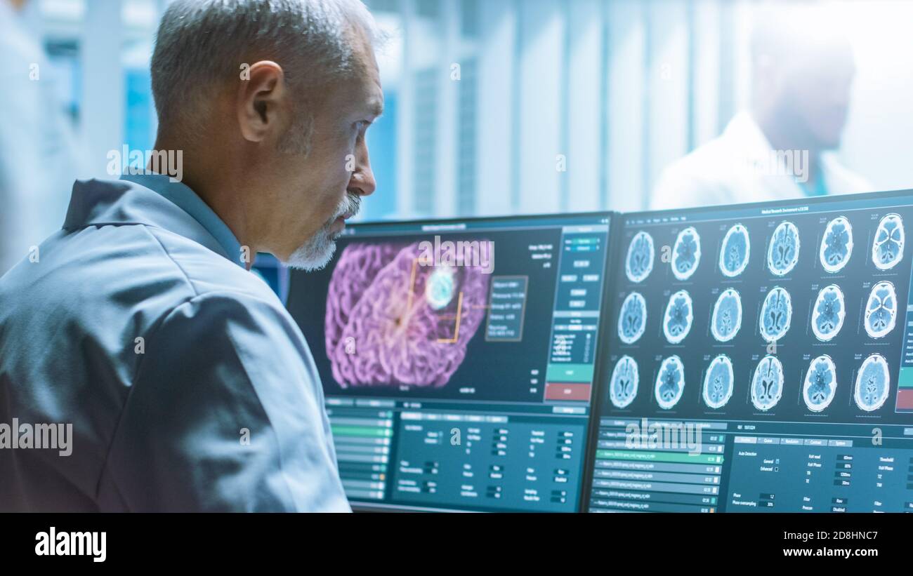 Senior Medical Research Scientist Working with Brain Scans on His ...
