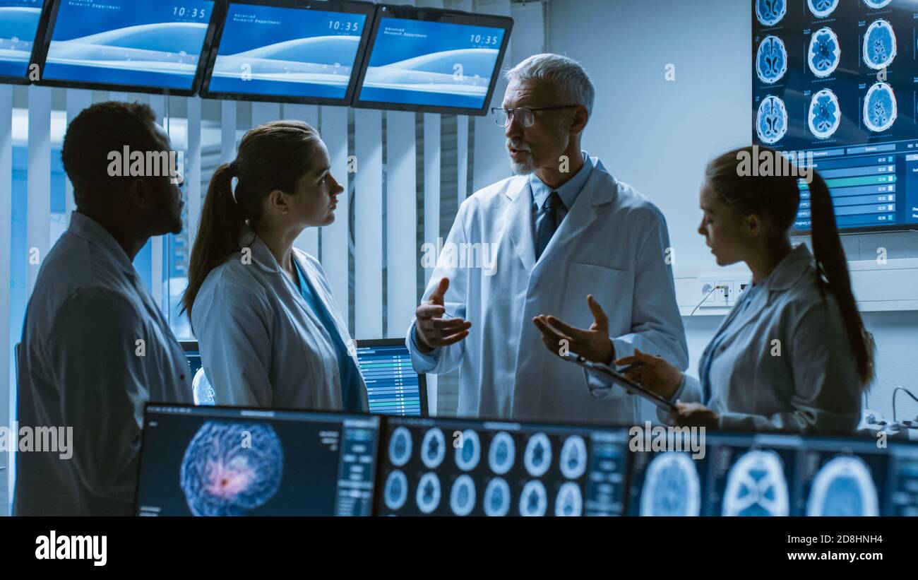 Diverse medical colleagues having conversation hi-res stock photography ...
