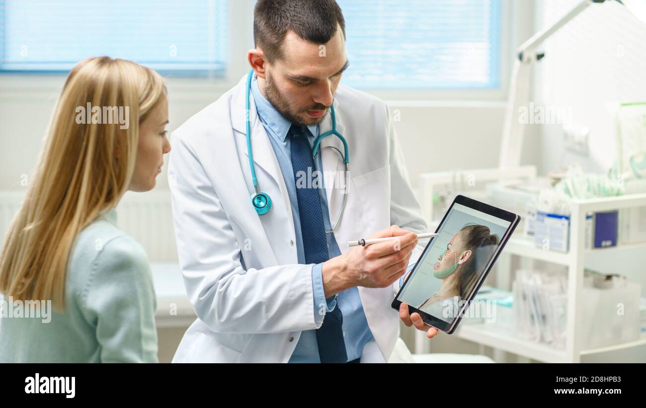 Plastic Cosmetic Surgeon Consults Woman about Facial Lift Surgery, He ...