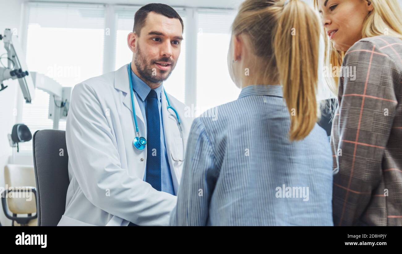 Low Angle Shot of Friendly Doctor Explaining How Medicine Works to a ...