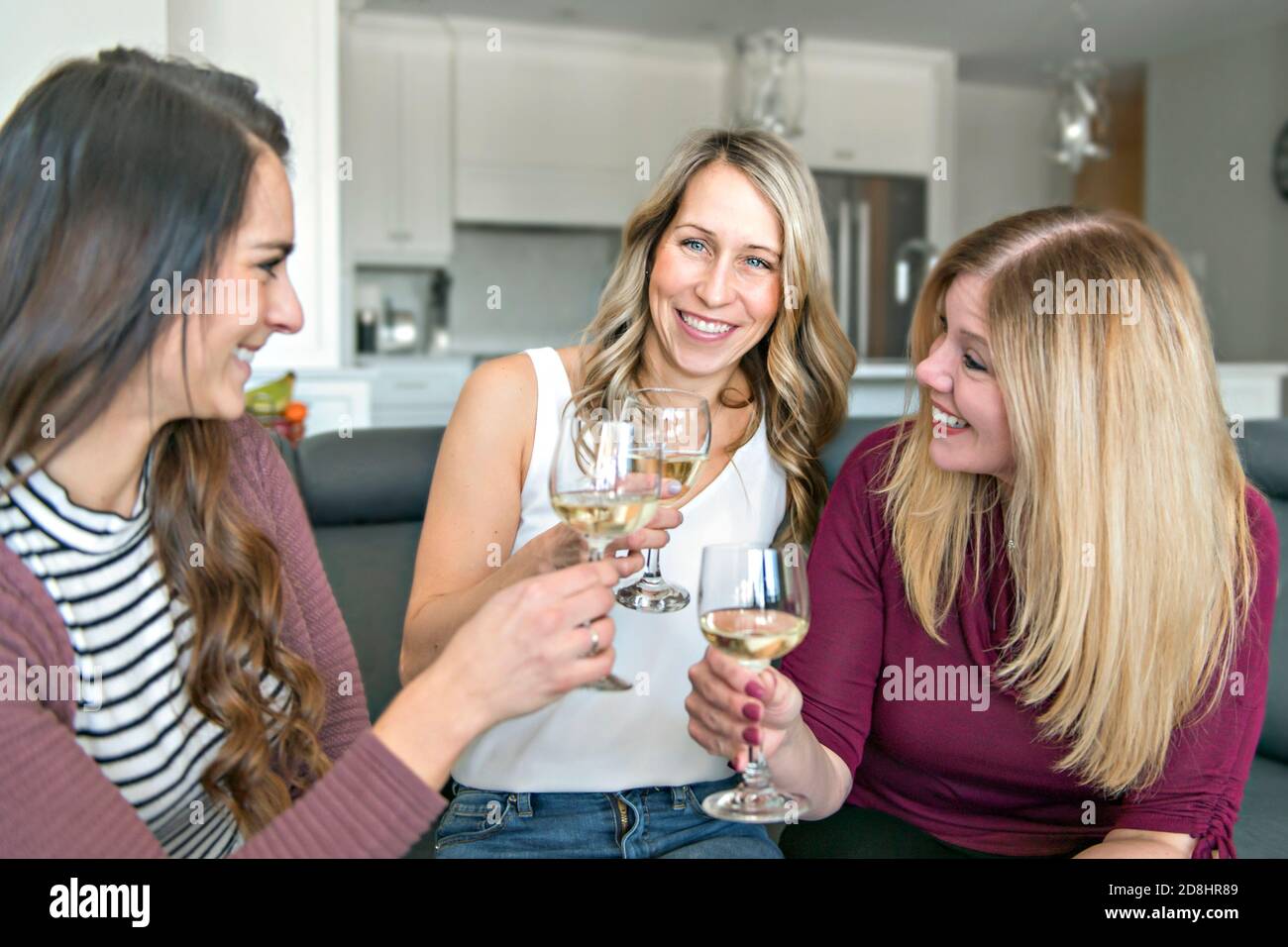 Five young women toast and celebrating their meeting Stock Photo - Alamy