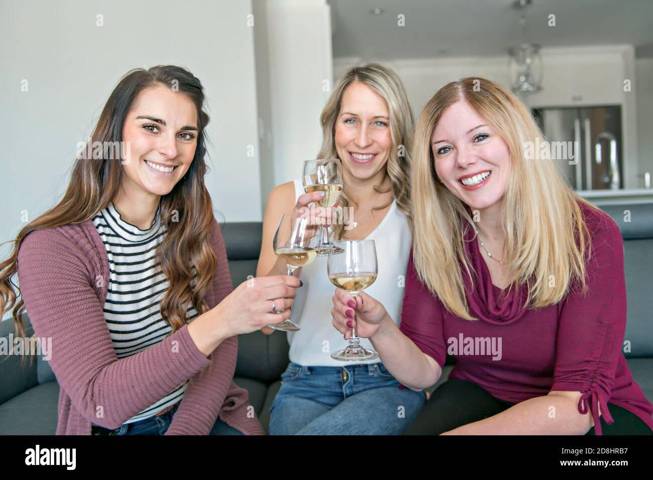 Five young women toast and celebrating their meeting Stock Photo - Alamy