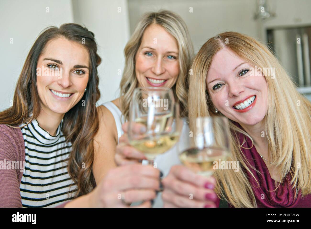 Five young women toast and celebrating their meeting Stock Photo - Alamy
