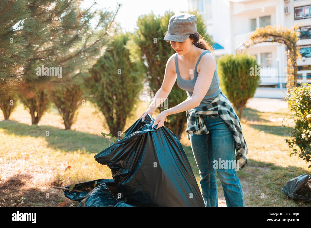 Woman litter house hi-res stock photography and images - Alamy