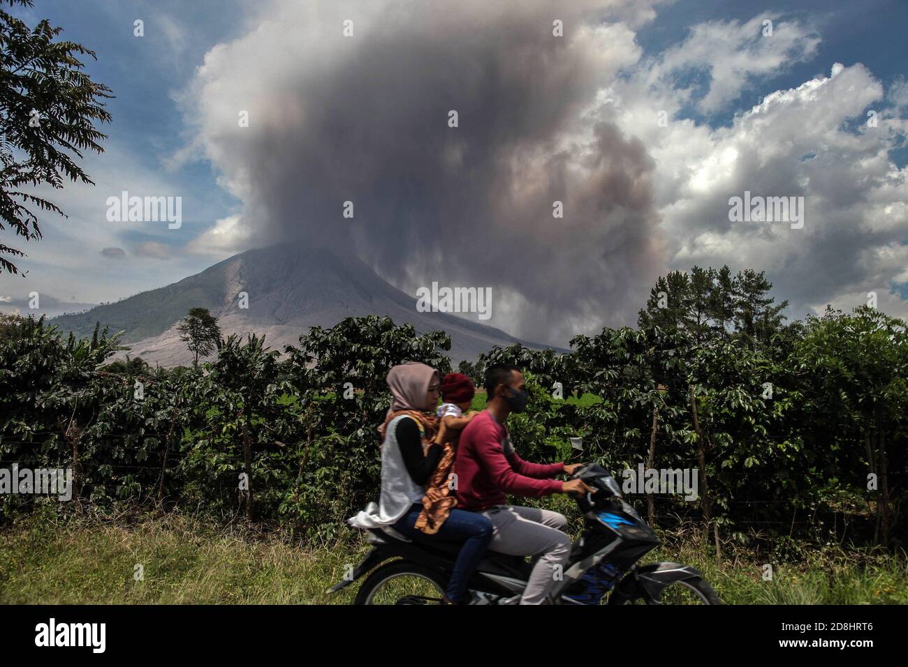 Karo, North Sumatra, Indonesia. 30th Oct, 2020. Motorists passing as ...