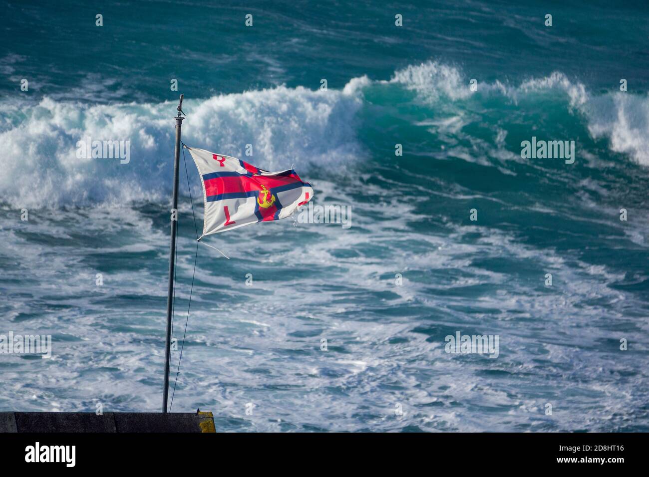 RNLI Flag, sea, waves Stock Photo - Alamy